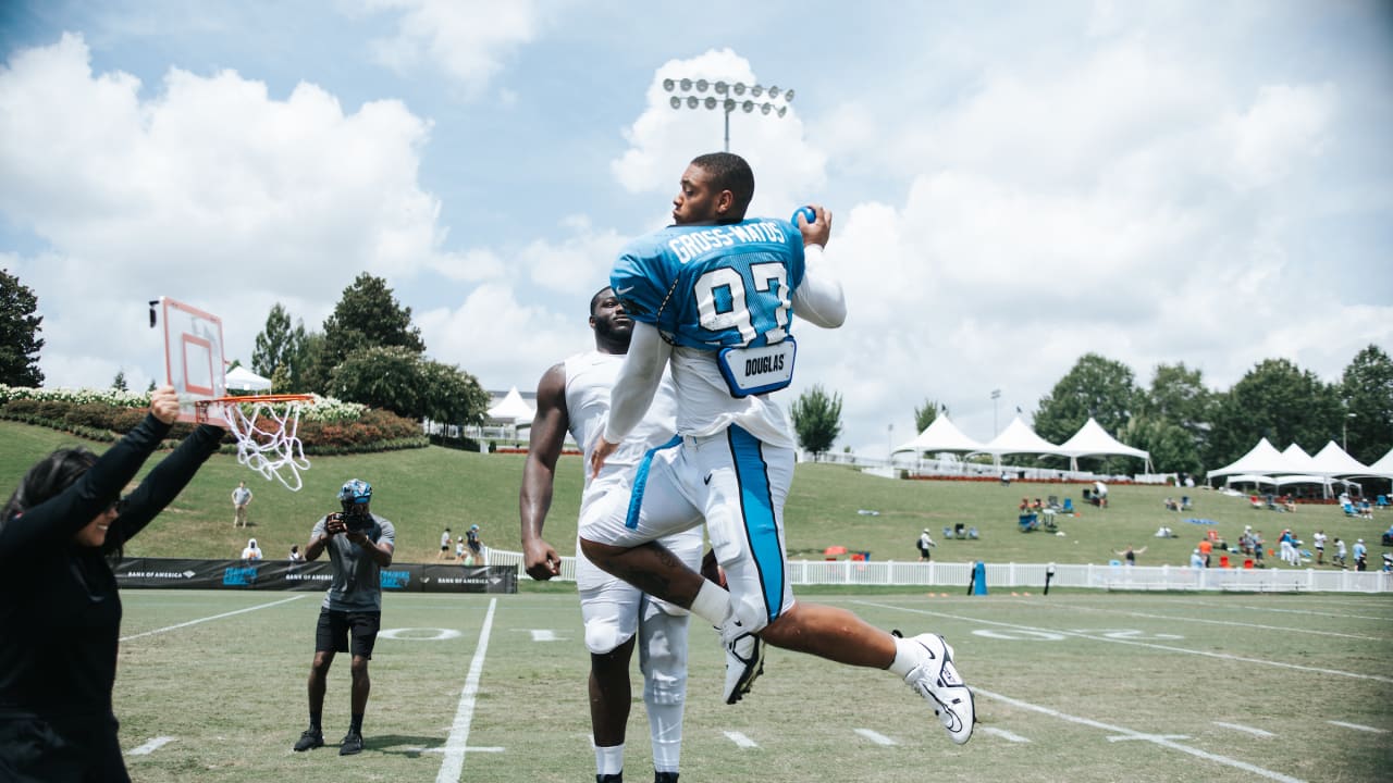PHOTOS: Panthers players have fun with mini basketball hoop