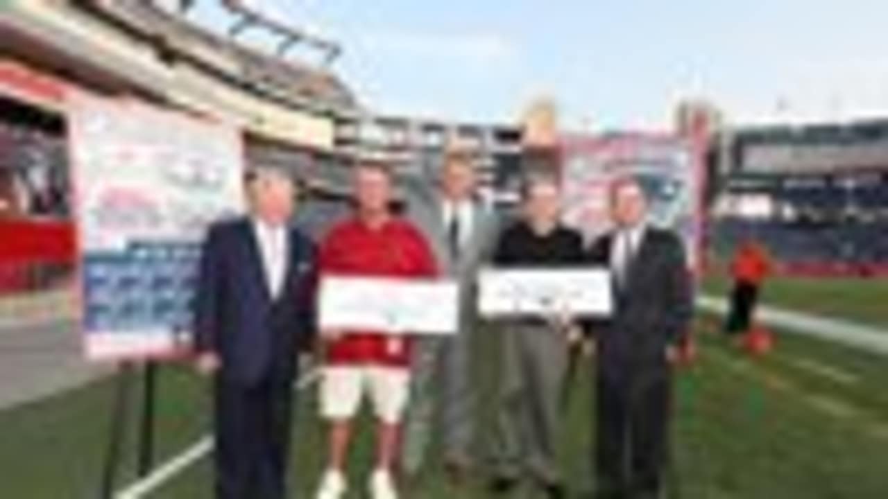 Patriots Hand Off Checks