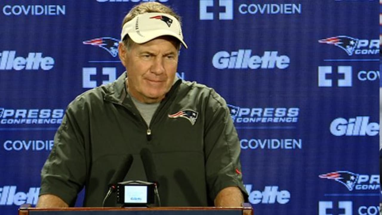 Burress returns, still not practicing at full speed