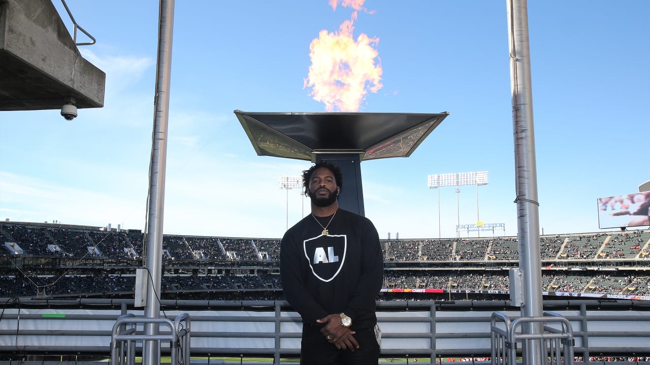 Former Raiders fullback Marcel Reece lights Al Davis Memorial Torch