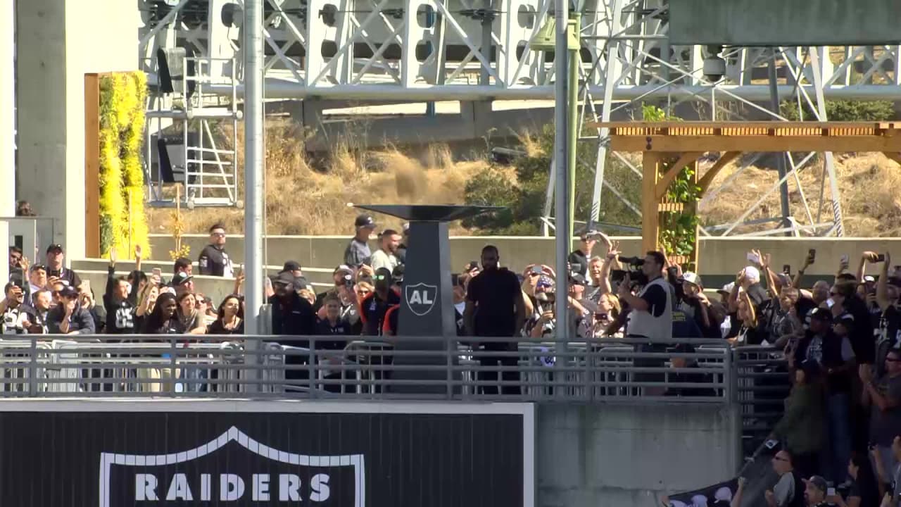 Darren McFadden lights Torch in honor of Al Davis