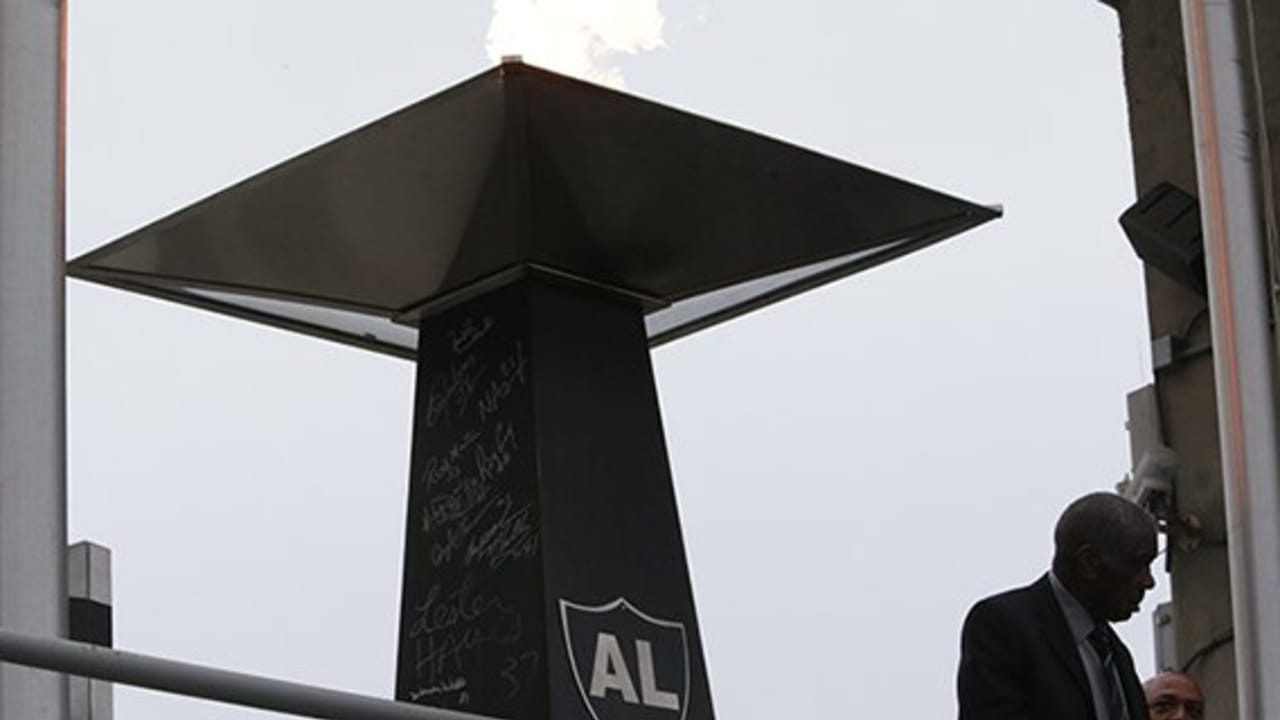 Warren Wells Lights Torch in Honor of Al Davis