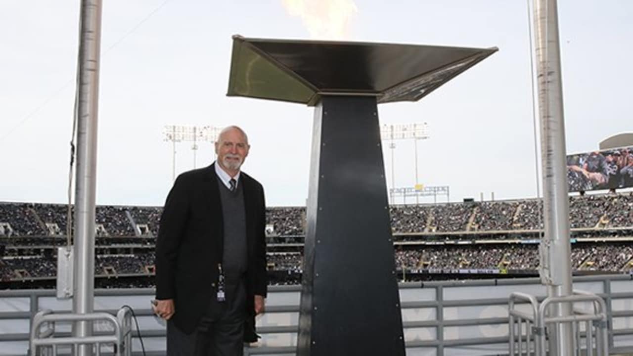 Monte Johnson Lights Torch in Honor of Al Davis