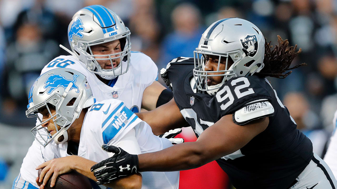 DT P.J. Hall bursts through line for his first sack