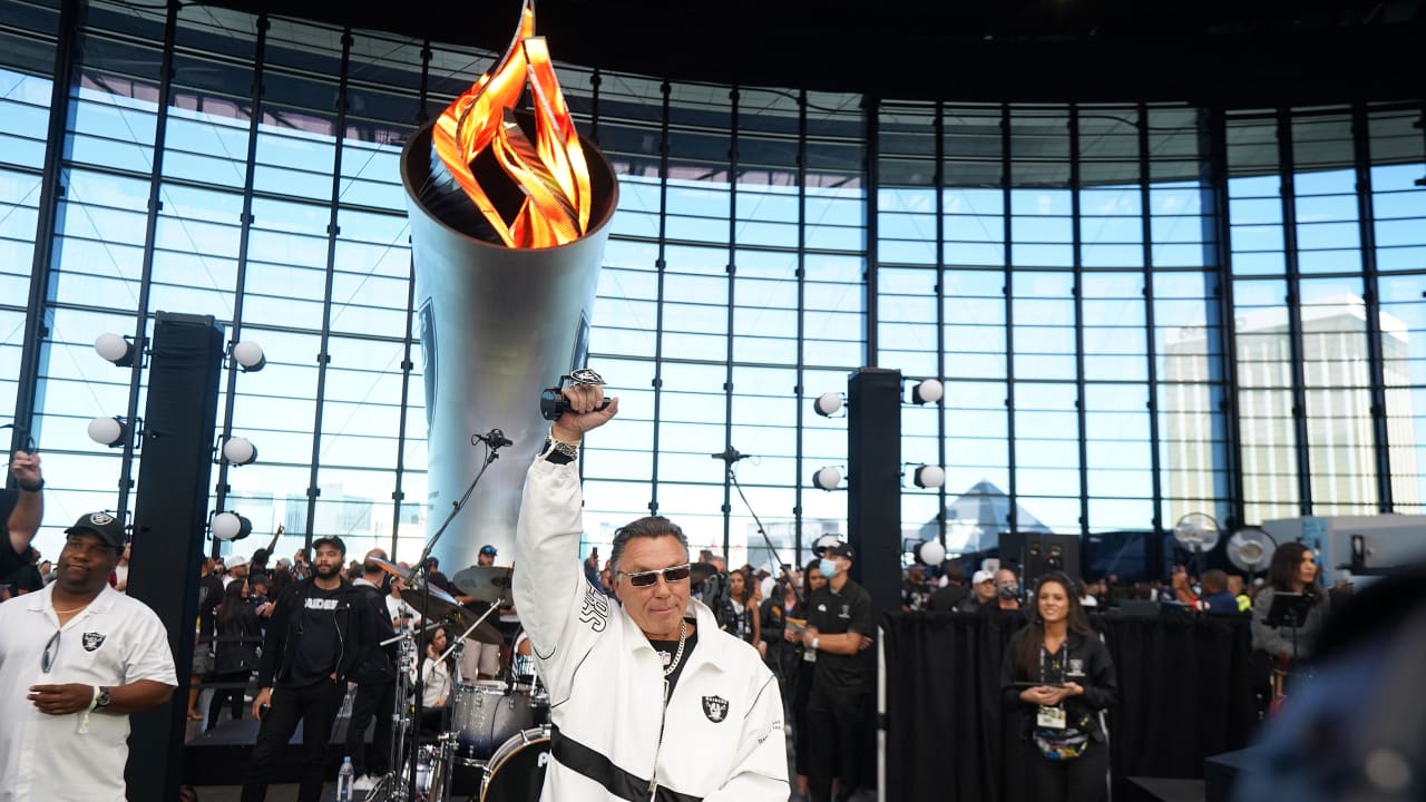 Tommy White lights the Torch in memory of and tribute to Al Davis