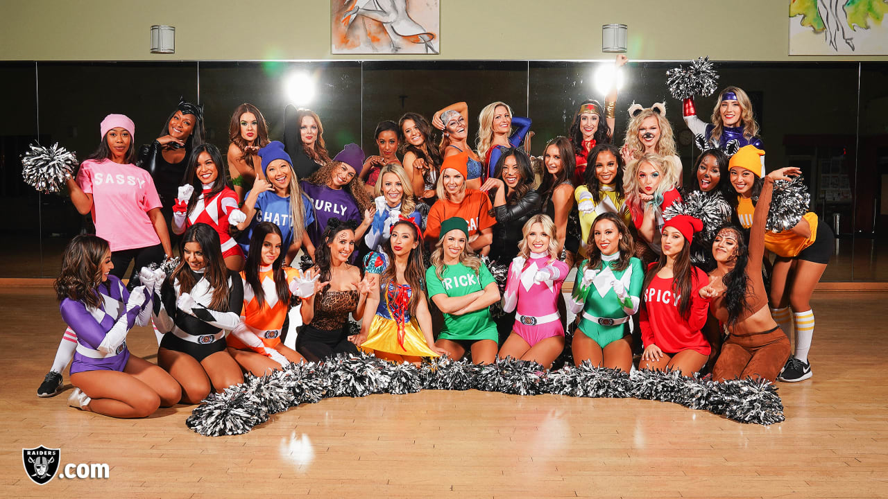 Raiderettes practice in their Halloween costumes