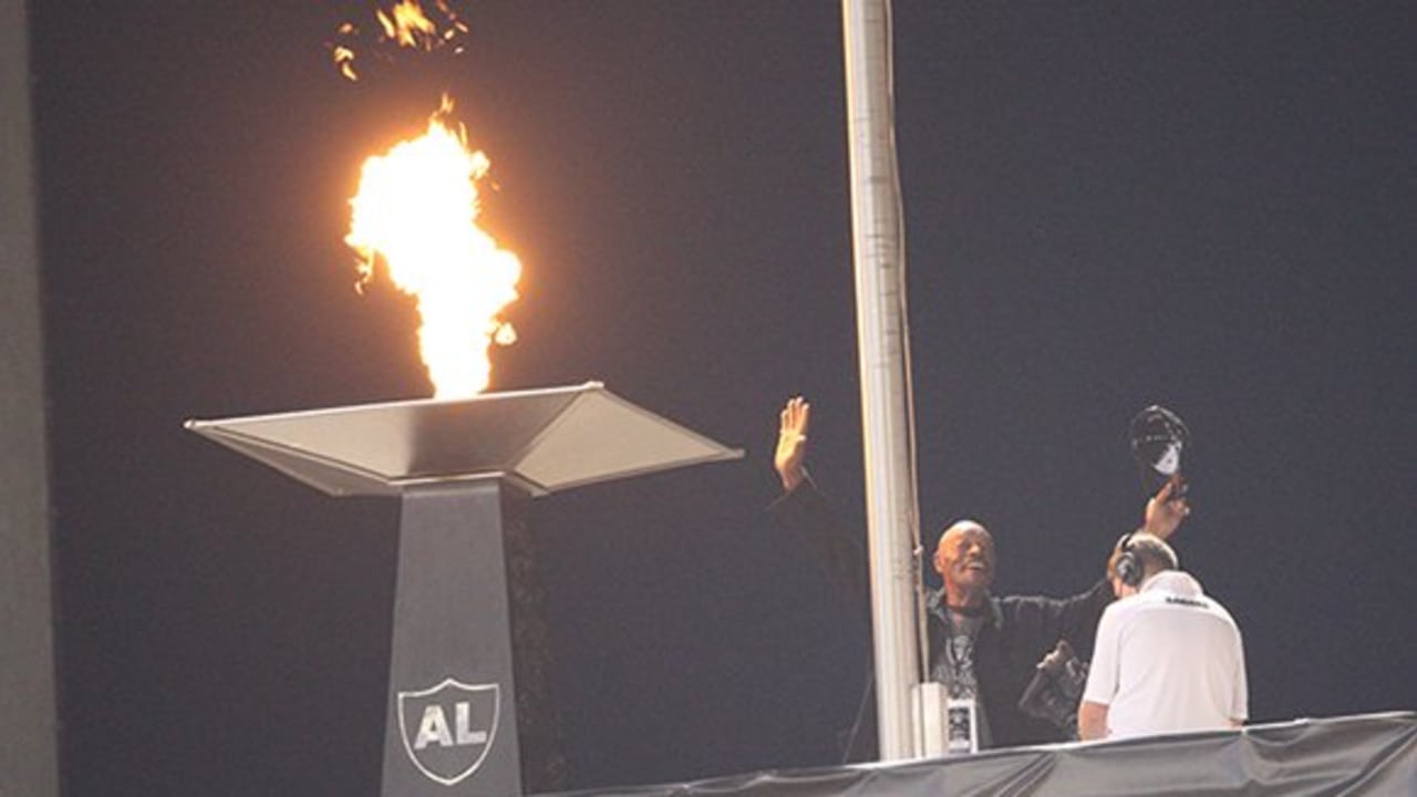 Otis Sistrunk Lights Torch in Honor of Al Davis