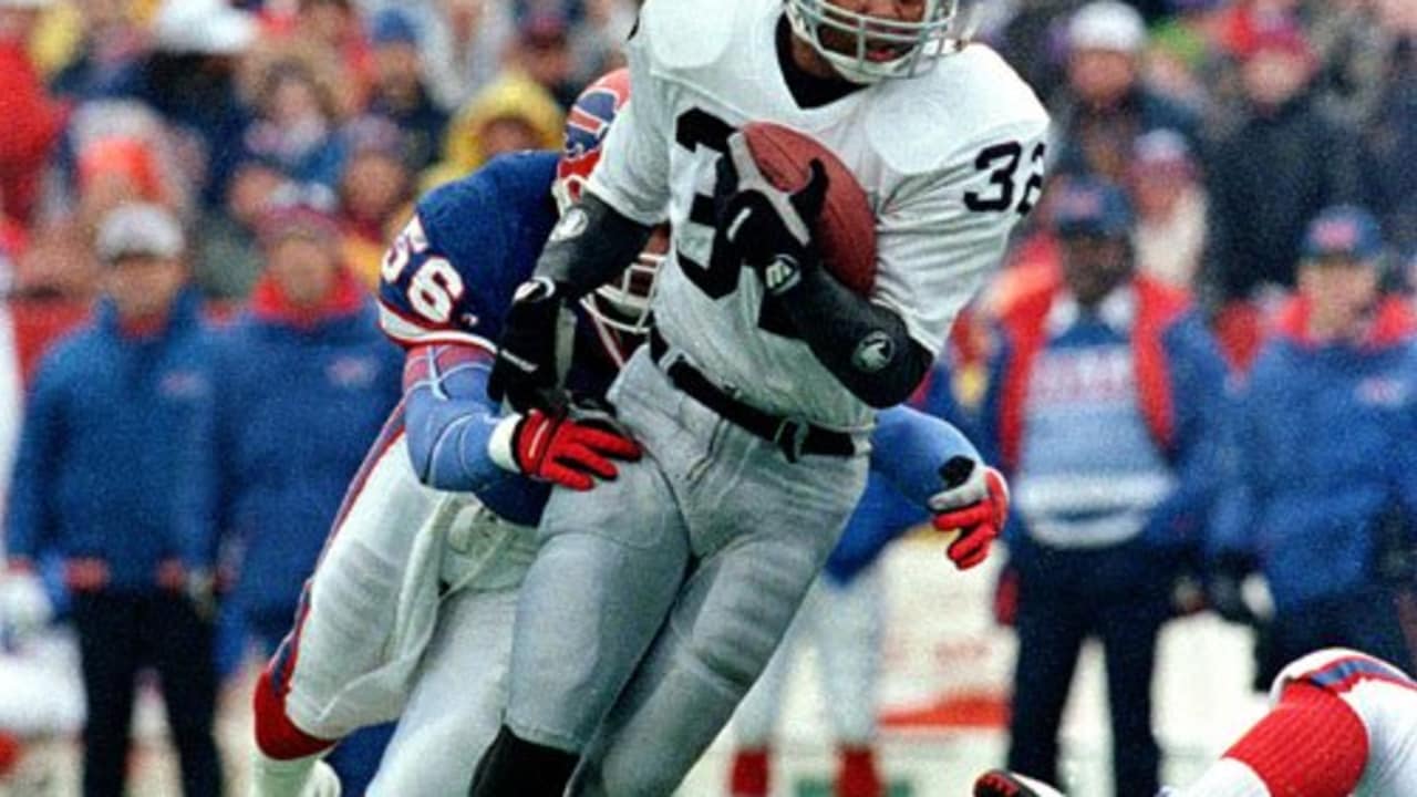 RAIDERS-BILLS RIVALRY IN PICTURES