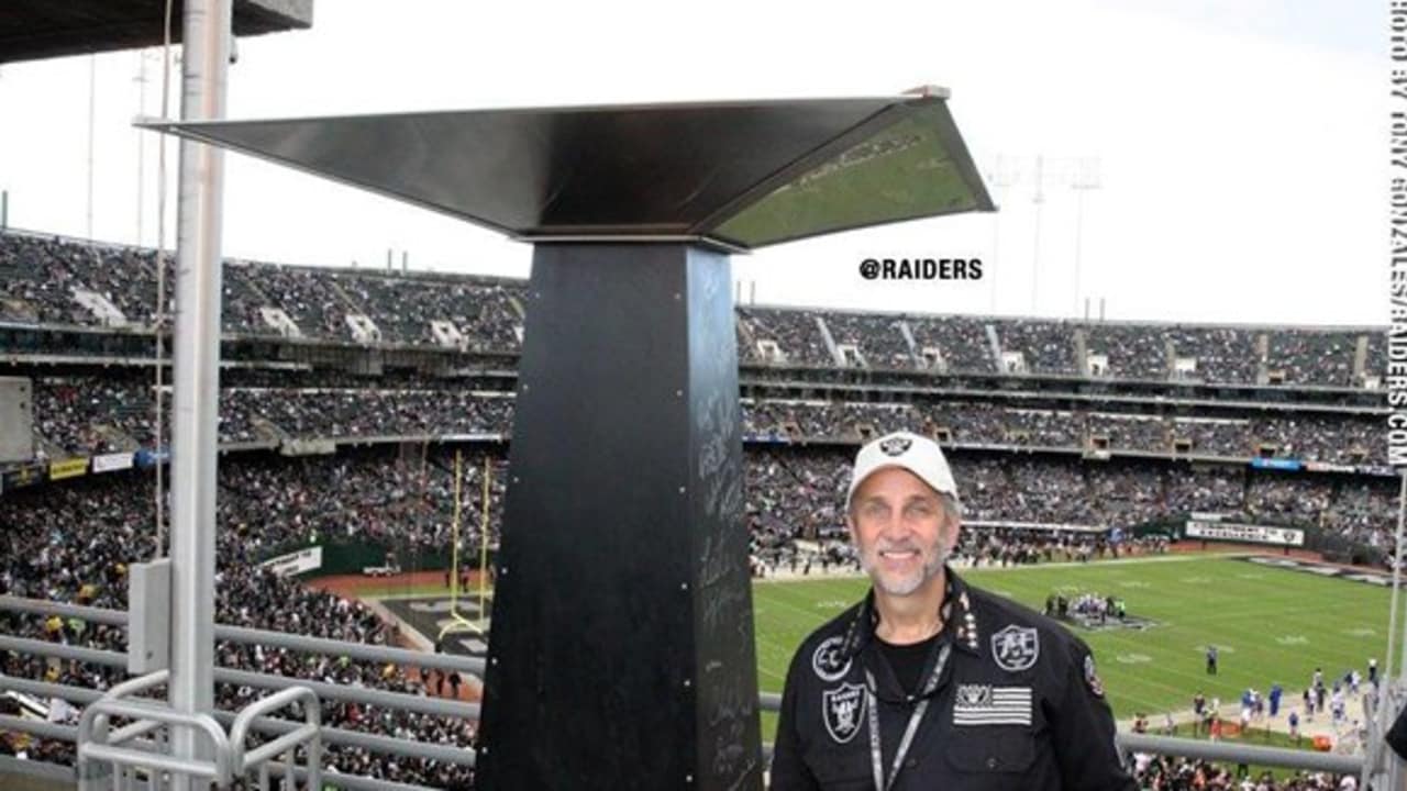 Raiders fan Ron Rickard lights Torch in honor of Al Davis