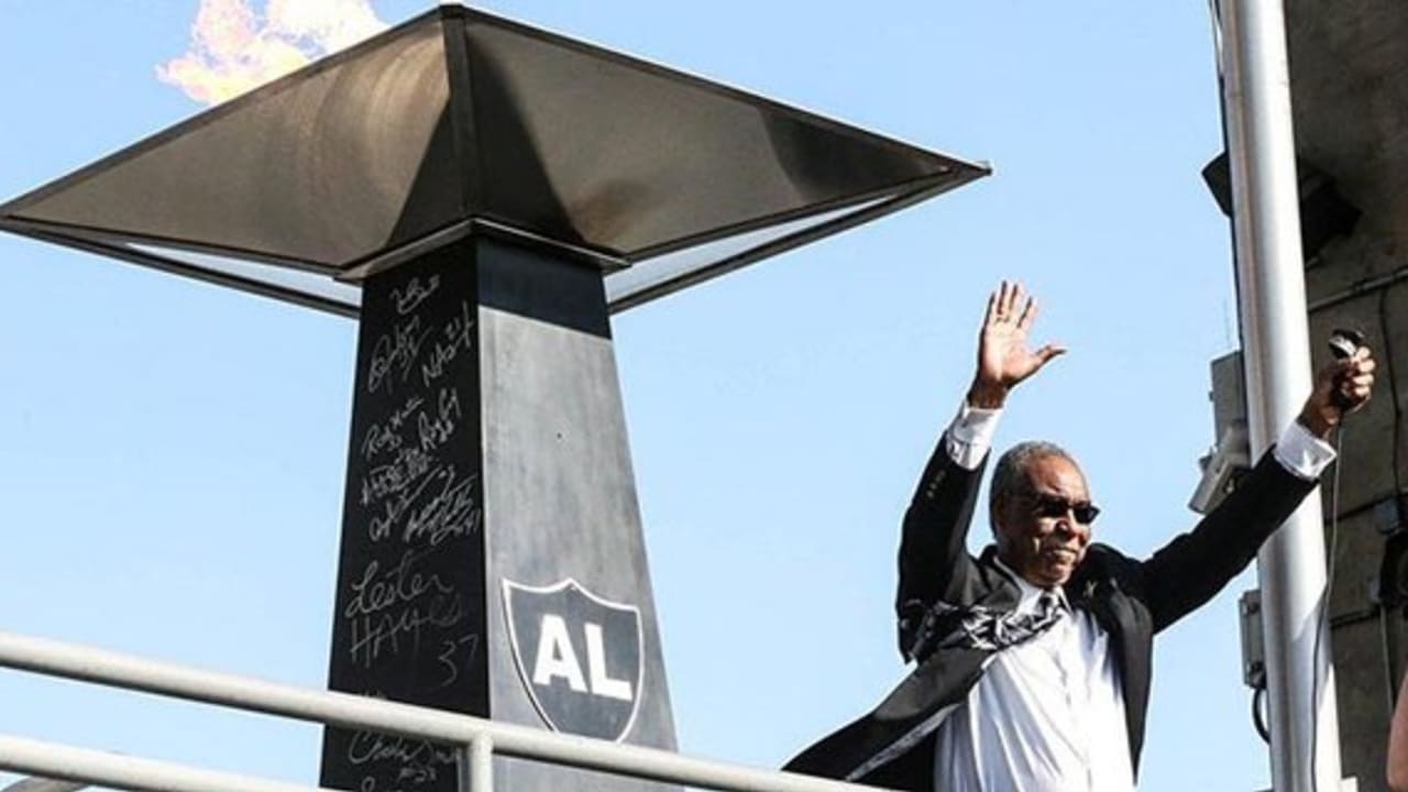Morris Bradshaw Lights Torch in Honor of Al Davis
