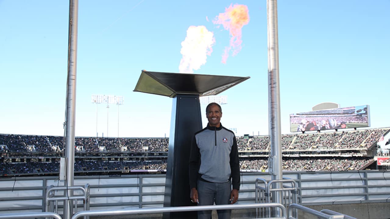 Mike Haynes Lights Al Davis Memorial Torch
