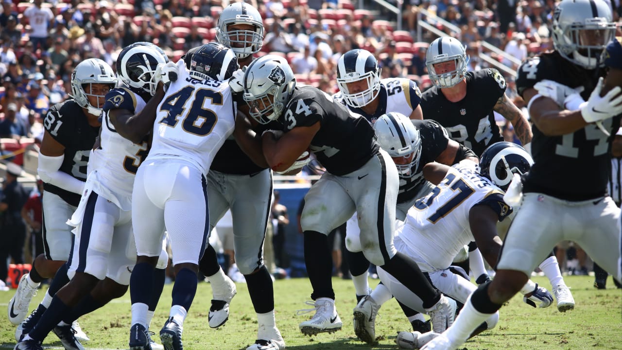 RB Chris Warren III bulldozes into the end zone for 3-yard TD