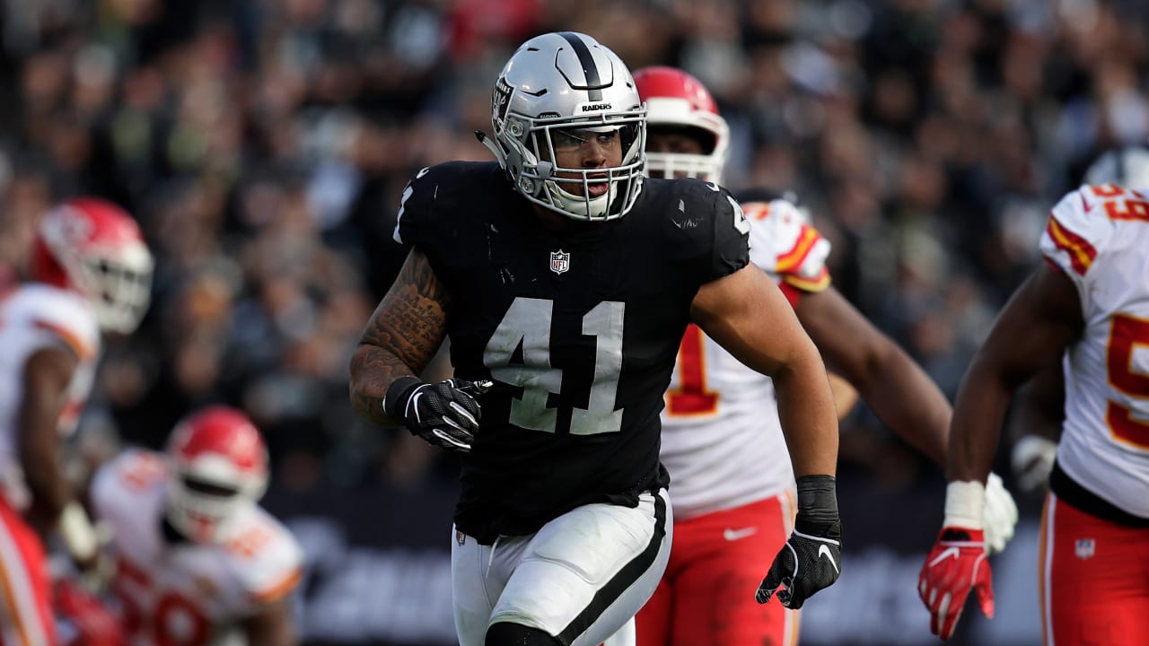 Raiders fullback Keith Smith and linebacker Jason Cabinda attend ...