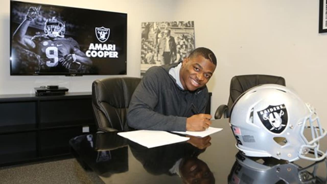 Cooper Signs His Contract