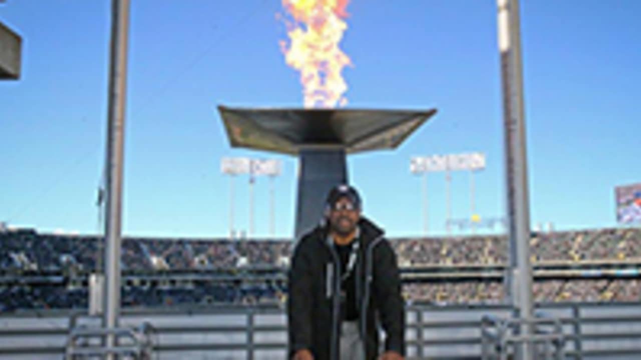 Former Raiders Running Back Clarence Davis Lights Al Davis Memorial Torch