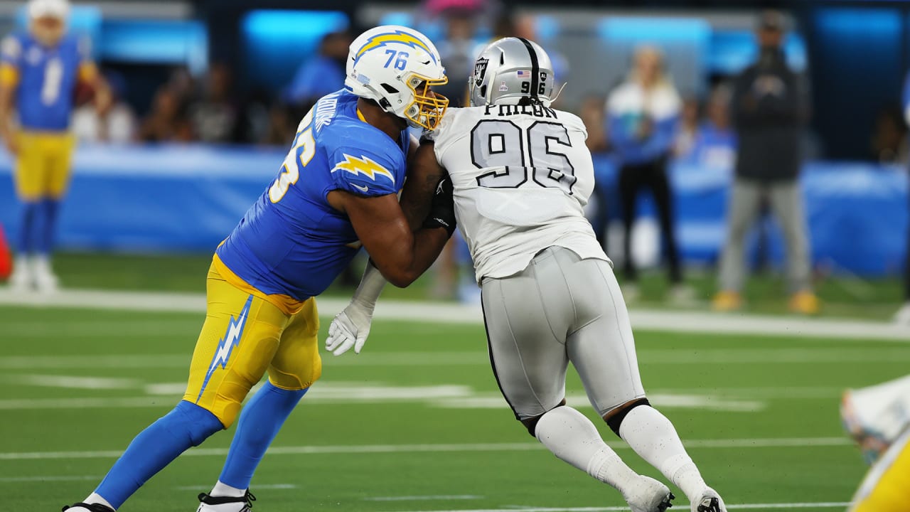 Darius Philon sprints into the backfield and gets to Herbert