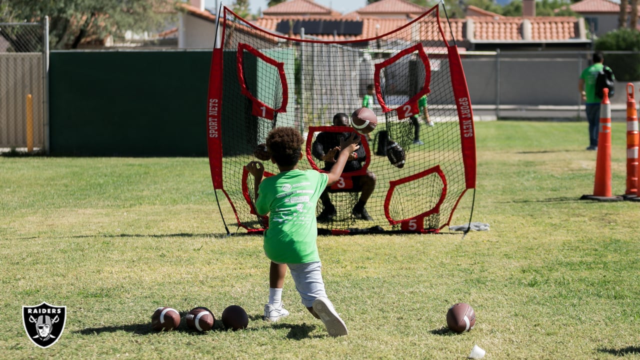 Photos: Raiders attend Boys and Girls Club 42nd annual Kids Day Out