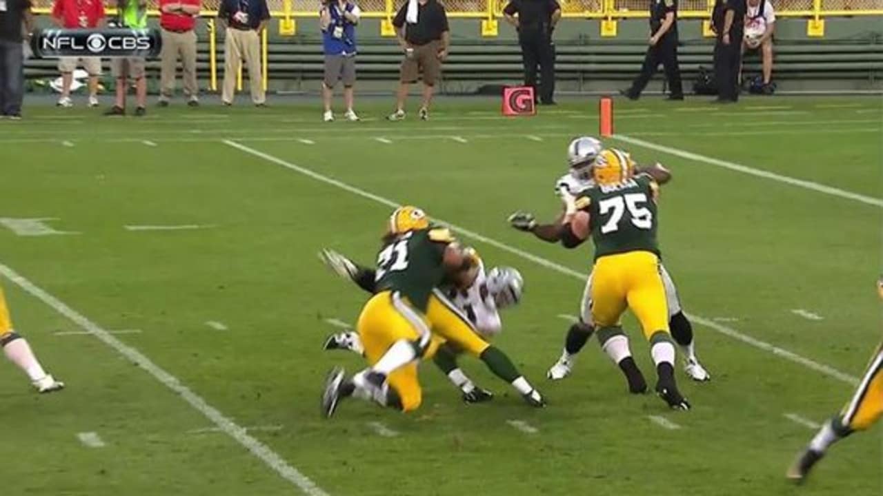 Aaron Rodgers sacked by Raiders DE LaMarr Woodley