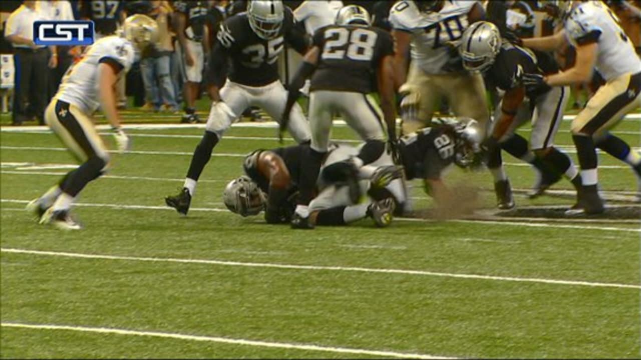 Oakland Raiders defensive end Jack Crawford recovers fumble