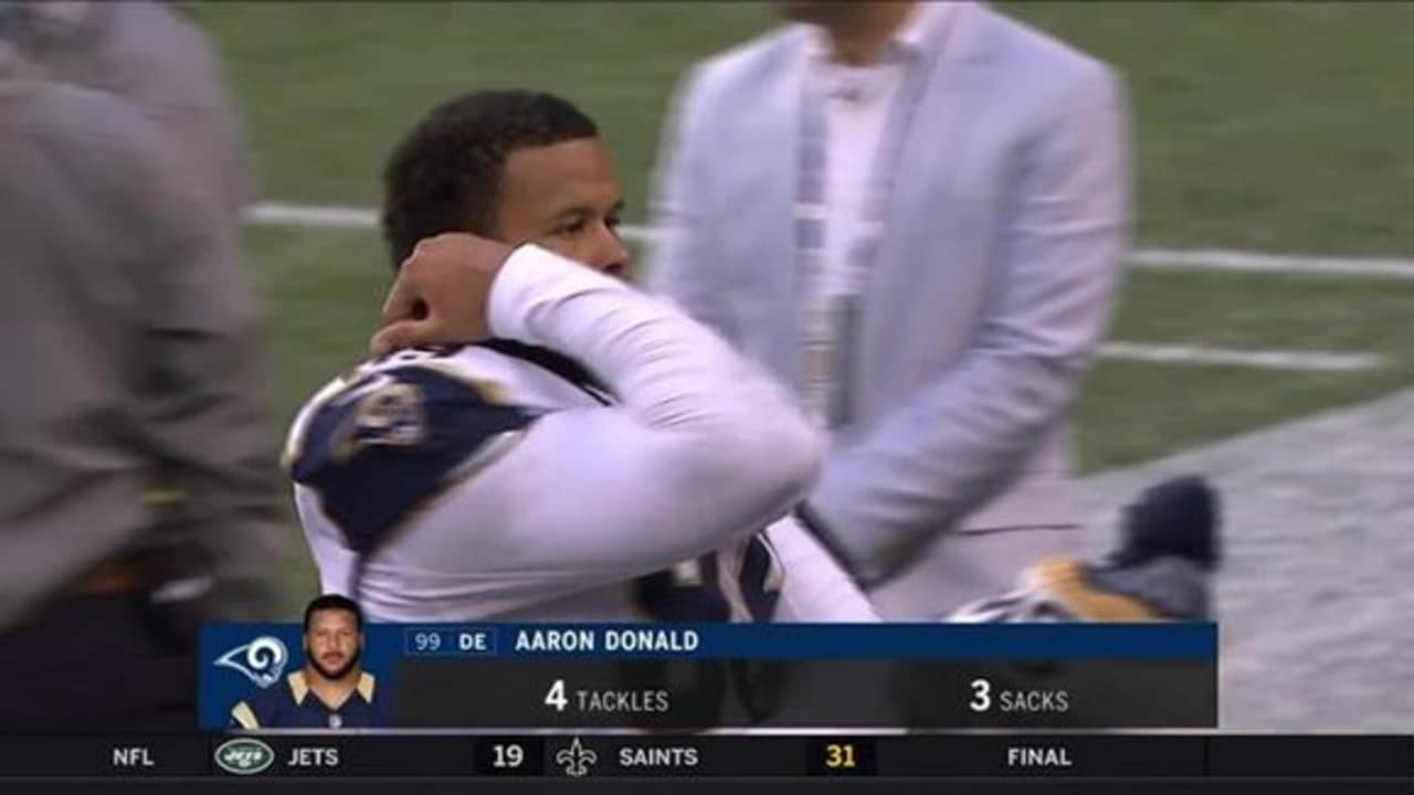 Los Angeles Rams celebrate on the sideline with game well in-hand