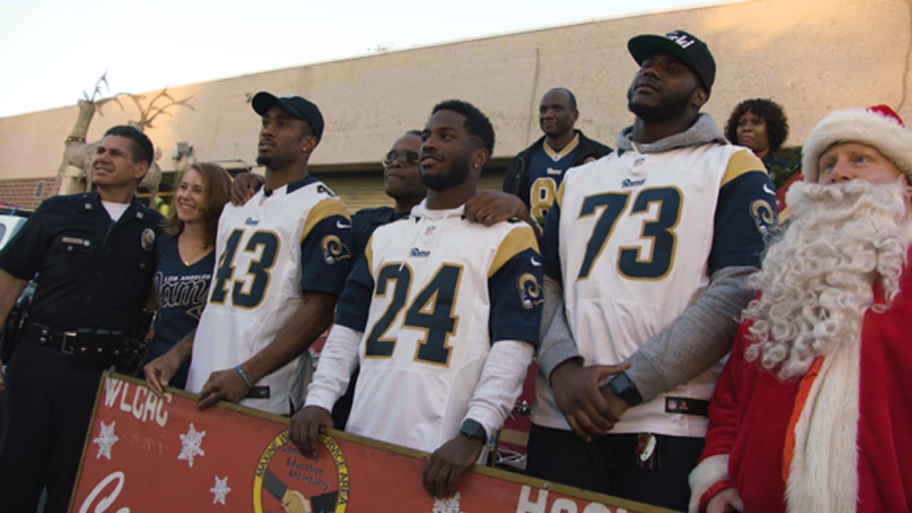 Rams Players take a Sleigh Ride through Watts