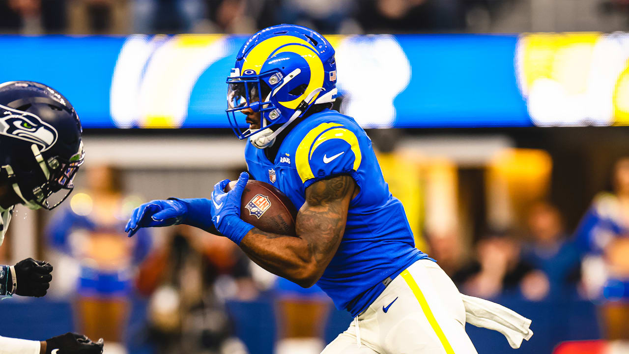 Los Angeles Rams running back Cam Akers speeds around the edge for 13 ...