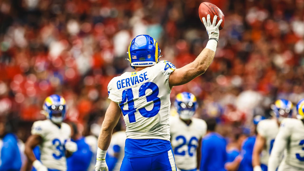Los Angeles Rams defensive tackle Michael Hoecht reaches in to block ...