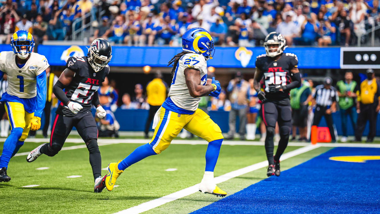 Los Angeles Rams running back Darrell Henderson Jr. rushes for an 8 ...