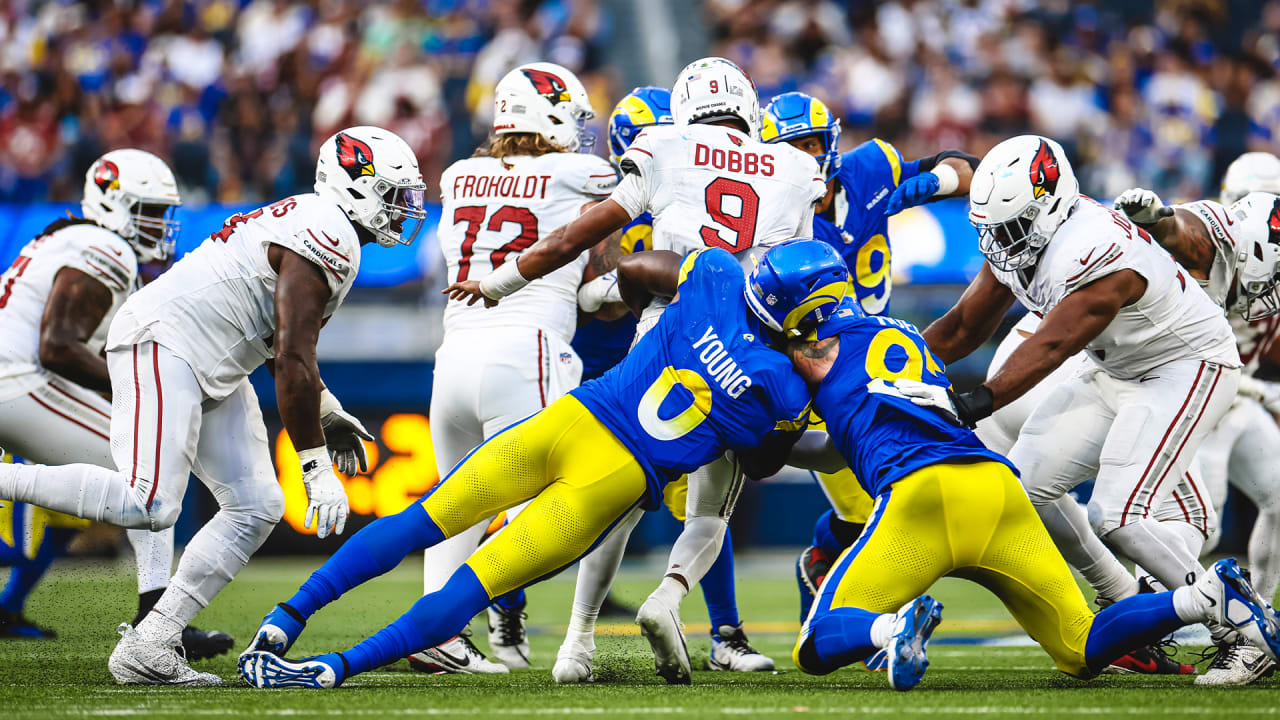 Los Angeles Rams outside linebacker Byron Young races into the ...