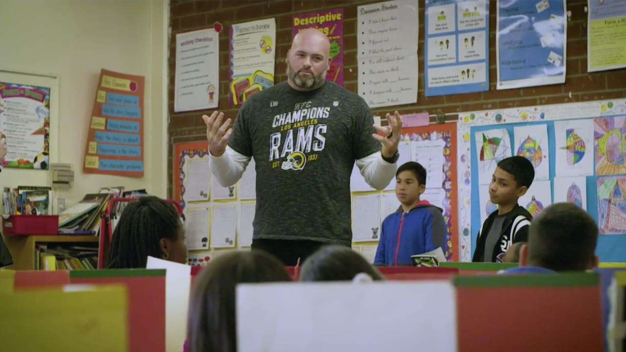 Andrew Whitworth stops by 112th Street Elementary for Read Across America Day