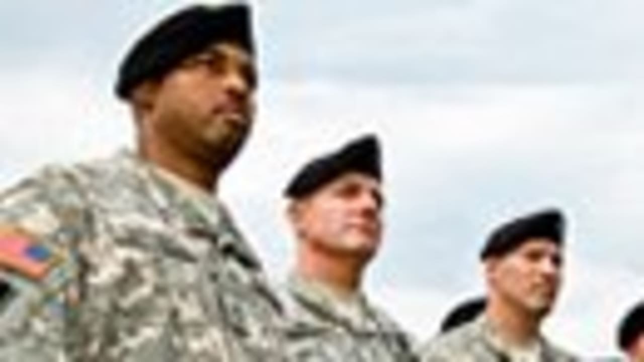 Harbaugh Departs on USO Tour