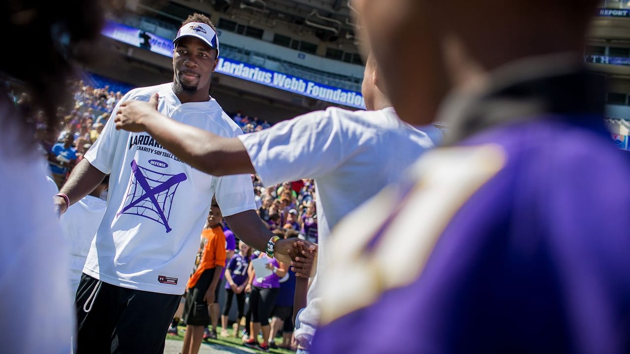 Action Shots: Ravens Take On Softball