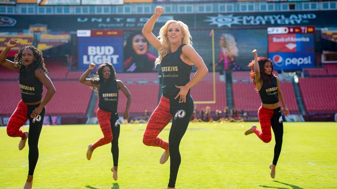 Cheerleaders Warm Up For Eagles