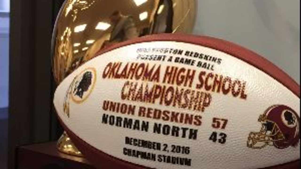 Tress Way Presents Redskins Championship Ball To His High School