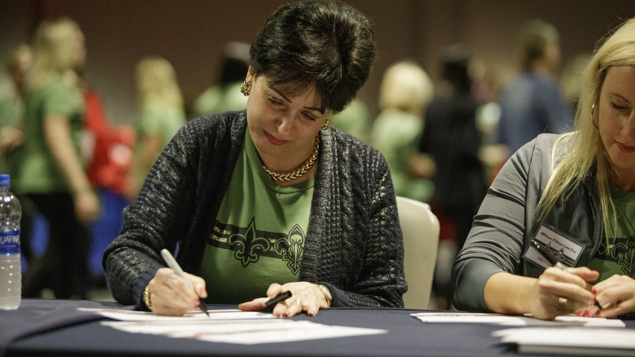 Saints employees, spouses prepare USO care packages at 2019 Ladies Event