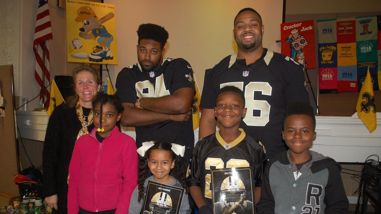 Akiem Hicks and Cameron Jordan visit Joshua Butler Elementary