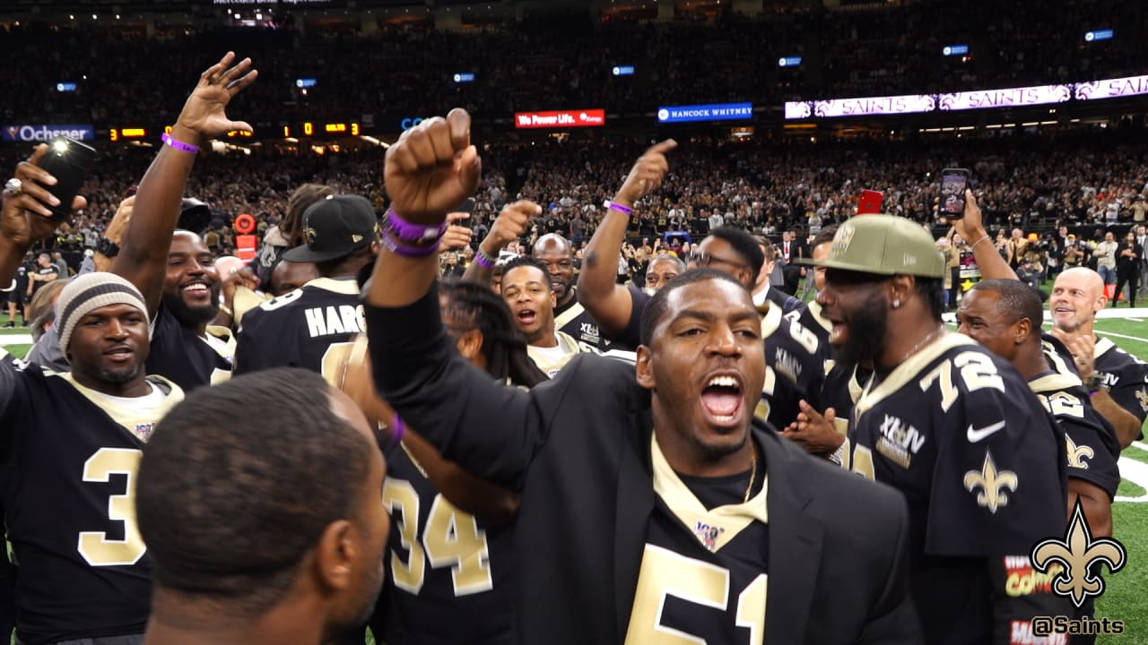 The 2009 Saints Super Bowl team leads the pregame chant vs. Colts