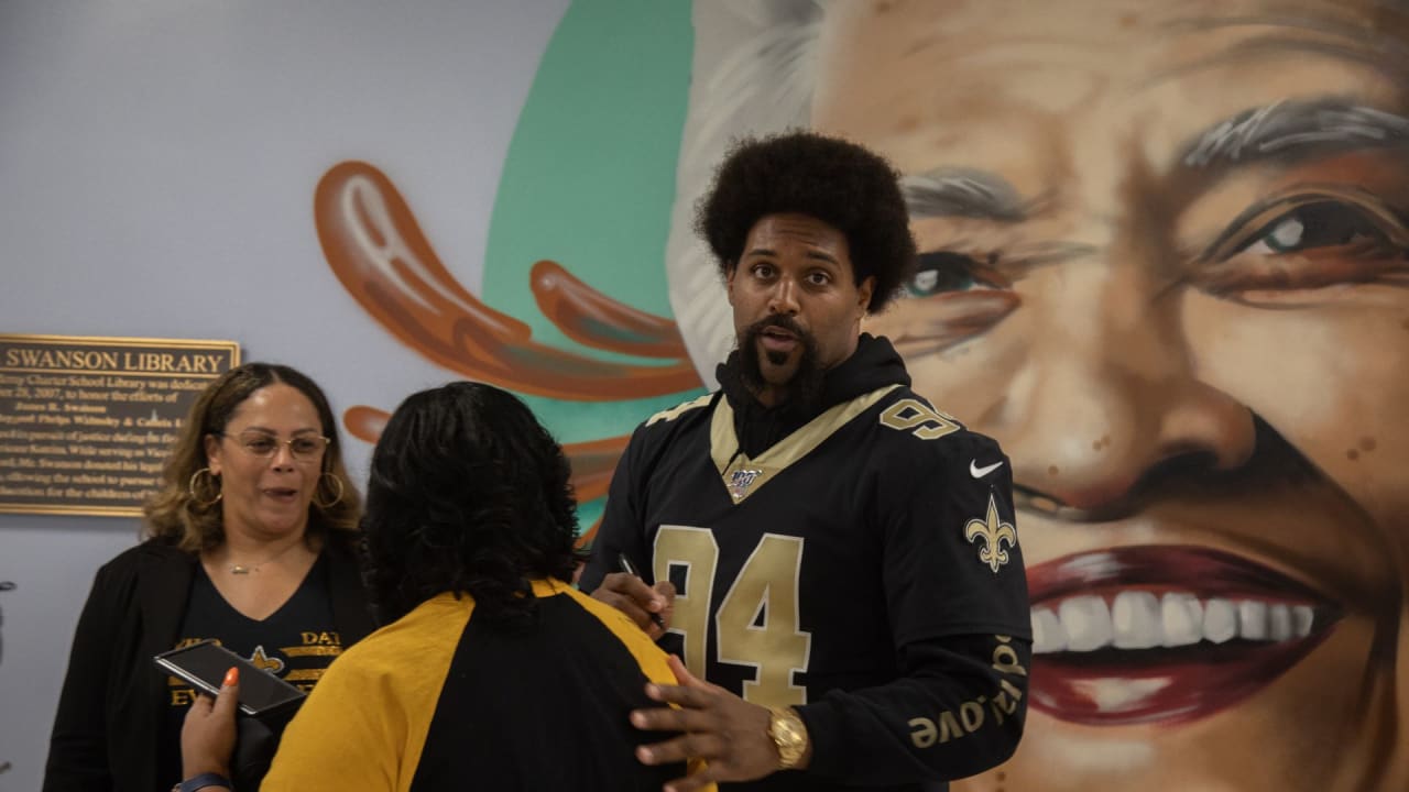Photos: Cam Jordan visits Lafayette Academy Lower Elementary School