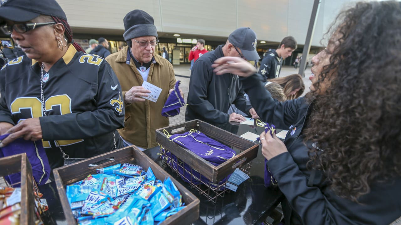 Fans participate in The Purple Bag Project with Saints, Crown Royal ...