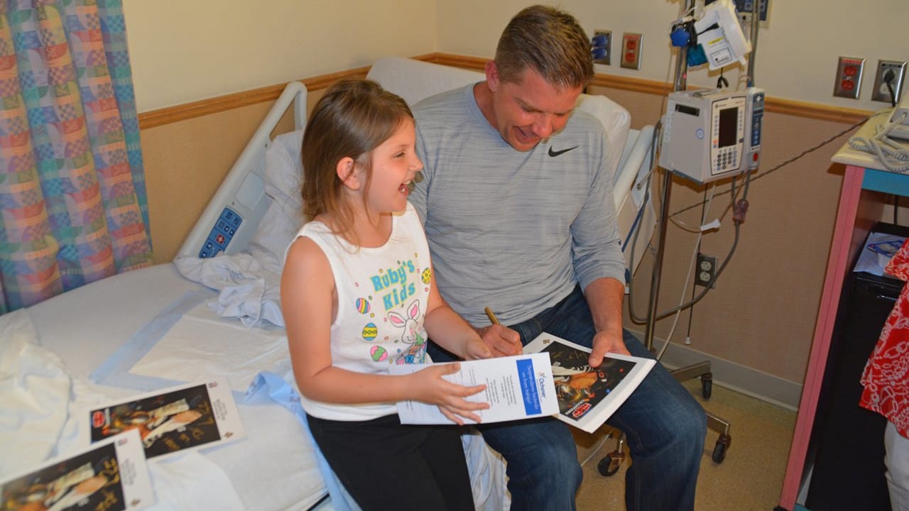Payton delivers gift baskets at Ochsner