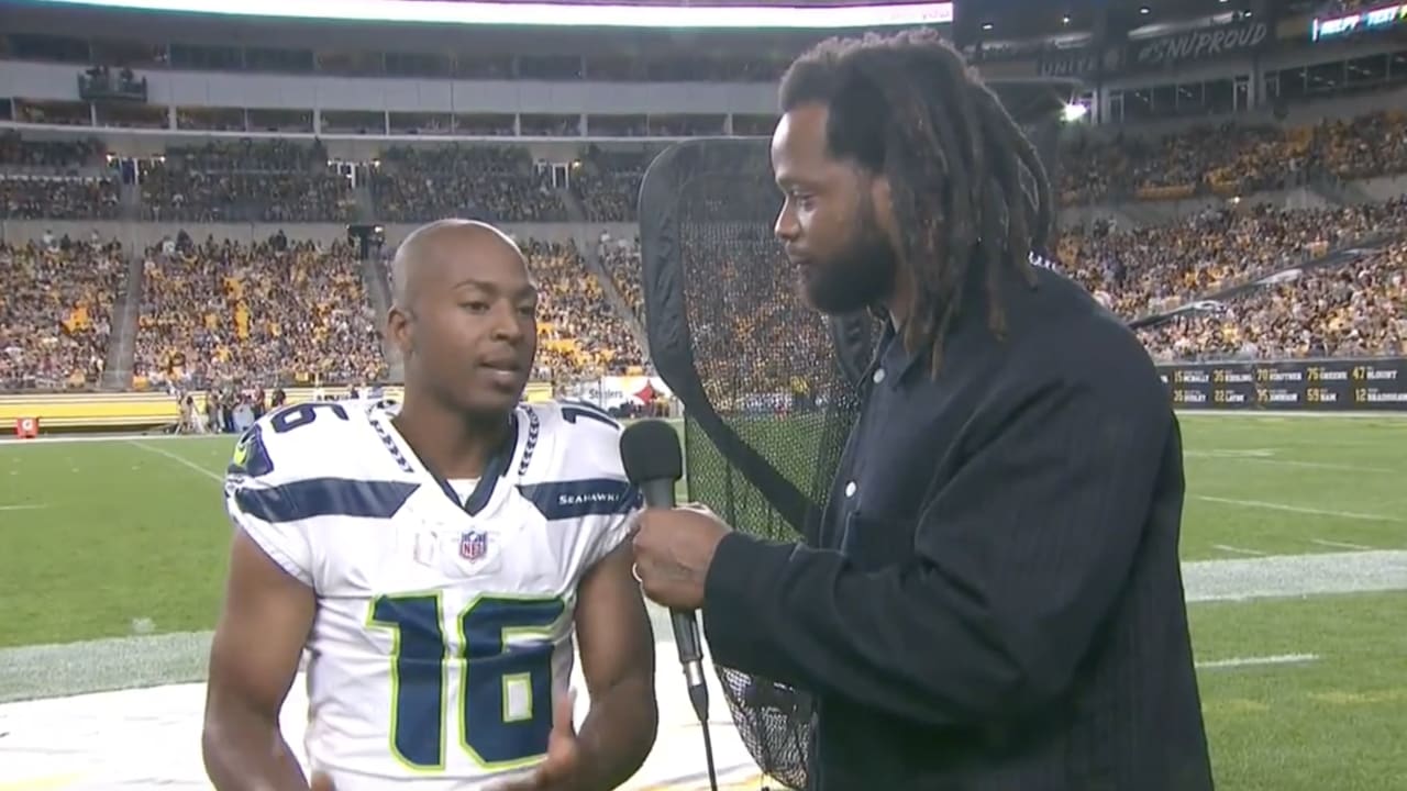 Michael Bennett Interviews Tyler Lockett On Sideline