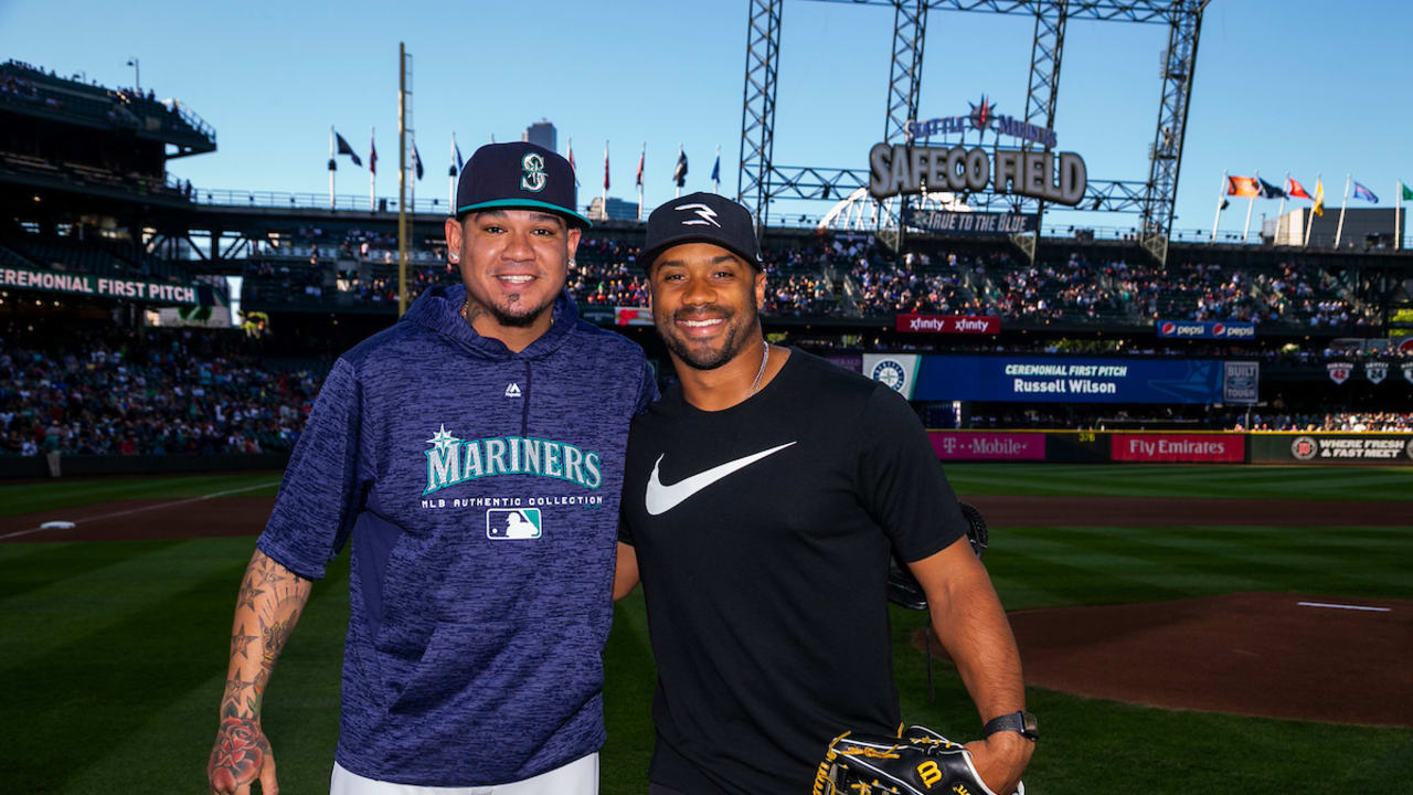 Russell Wilson Throws First Pitch For Seattle Mariners