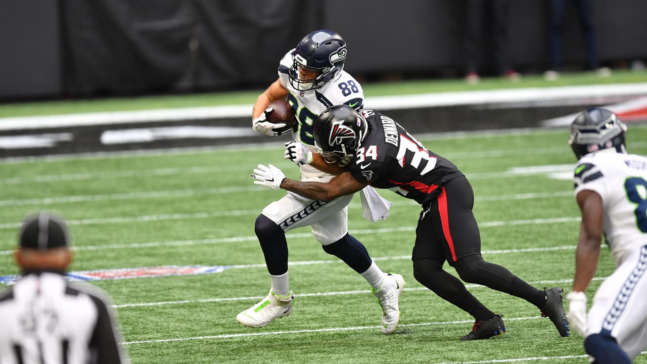 TE Greg Olsen's first grab for the Seahawks goes for a first down