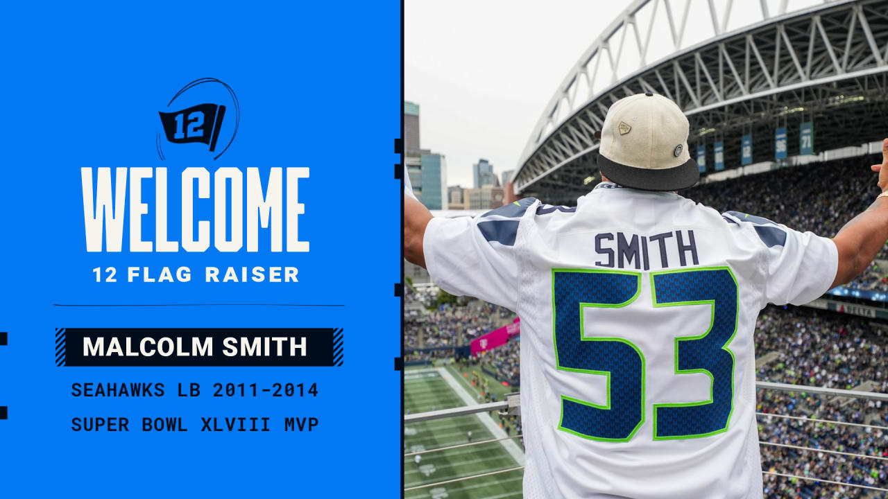 PHOTOS: Seahawks Legend Malcolm Smith Raises The 12 Flag For Week 3