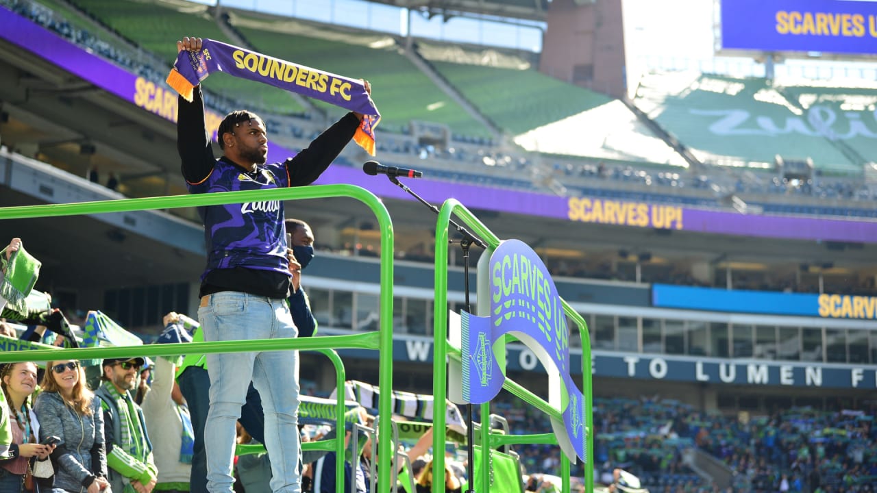 PHOTOS: Jordyn Brooks Leads Scarves Up At Sounders Game