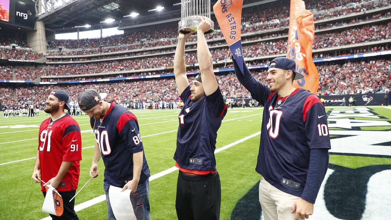 Astros visit Texans with World Series trophy