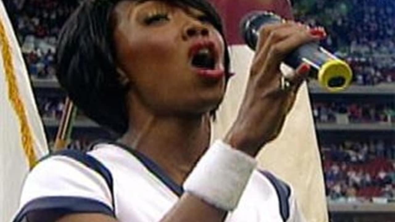 Crystal sings the national anthem