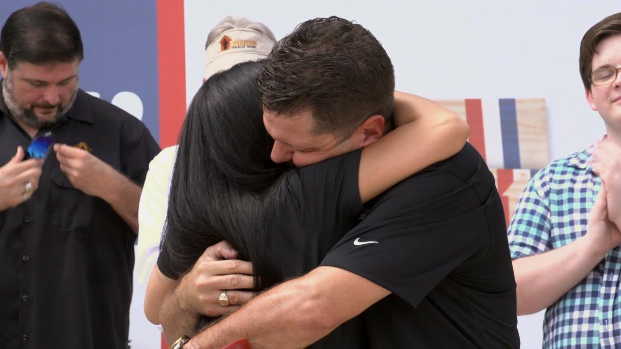 Bone family receives keys to new house