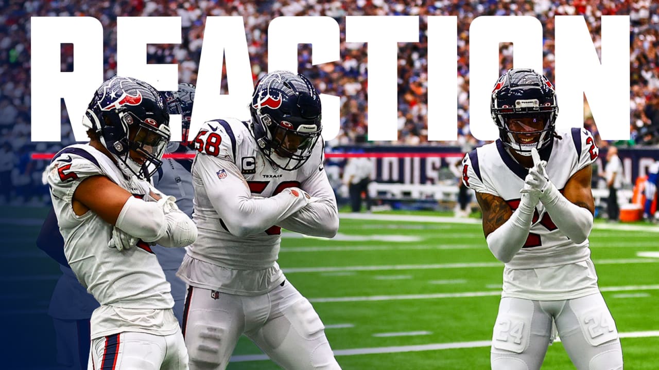 Texans D celebrates Jerry Hughes's INT