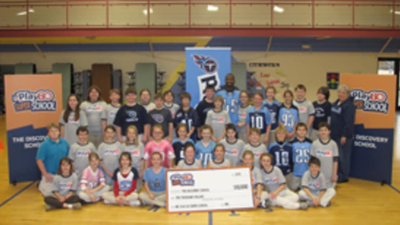 Hall Makes NFL 'Super School Visit' Delivering $10,000